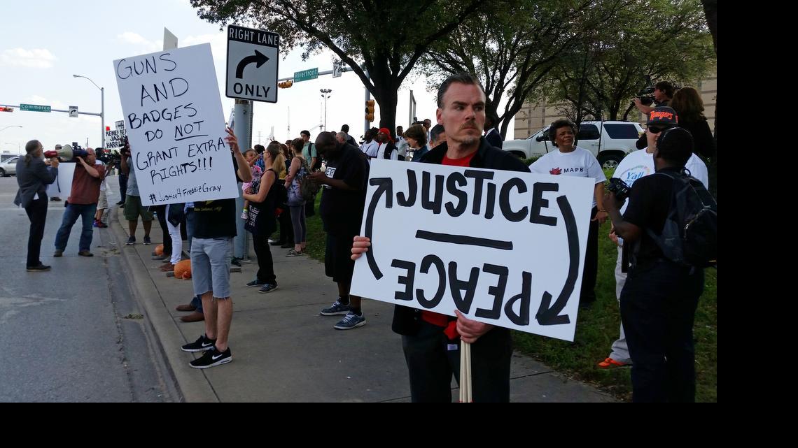 Dallas marchers protest police brutality in solidarity with Baltimore ...